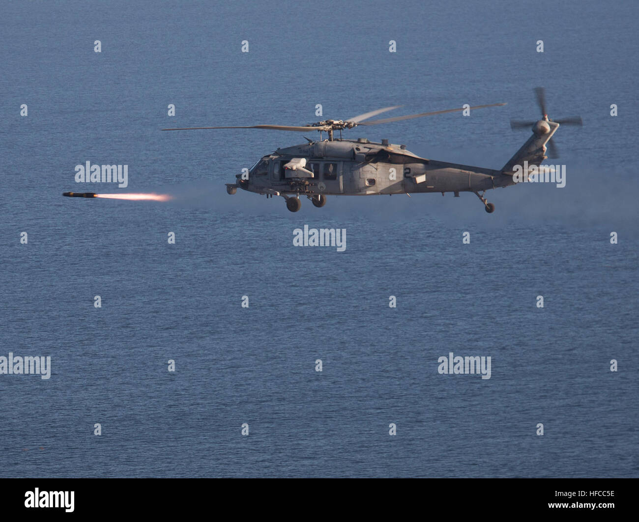 Helicopter fires hellfire missile hi-res stock photography and images ...