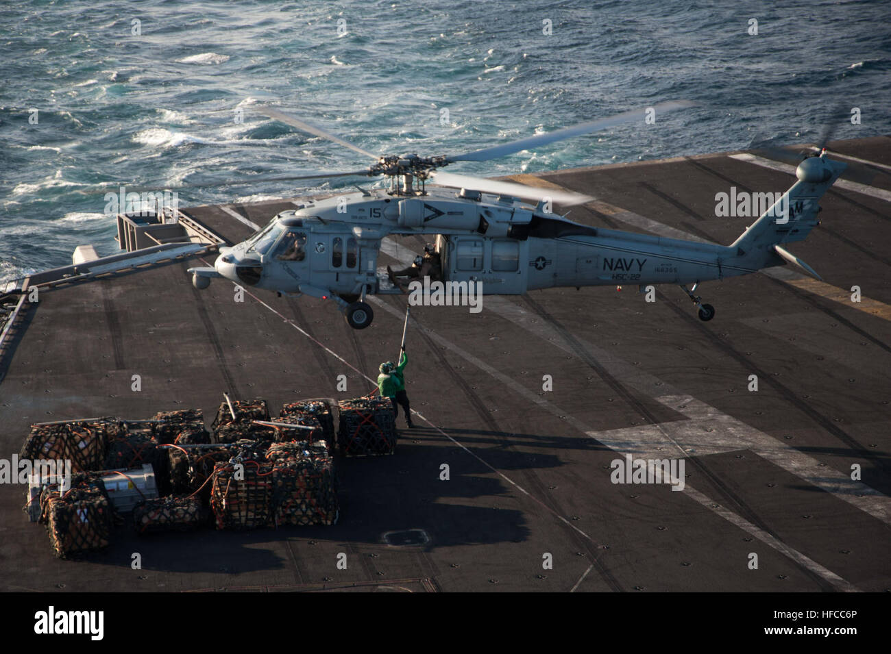 An MH-60S Sea Hawk helicopter, assigned to the "Sea Knights" of ...