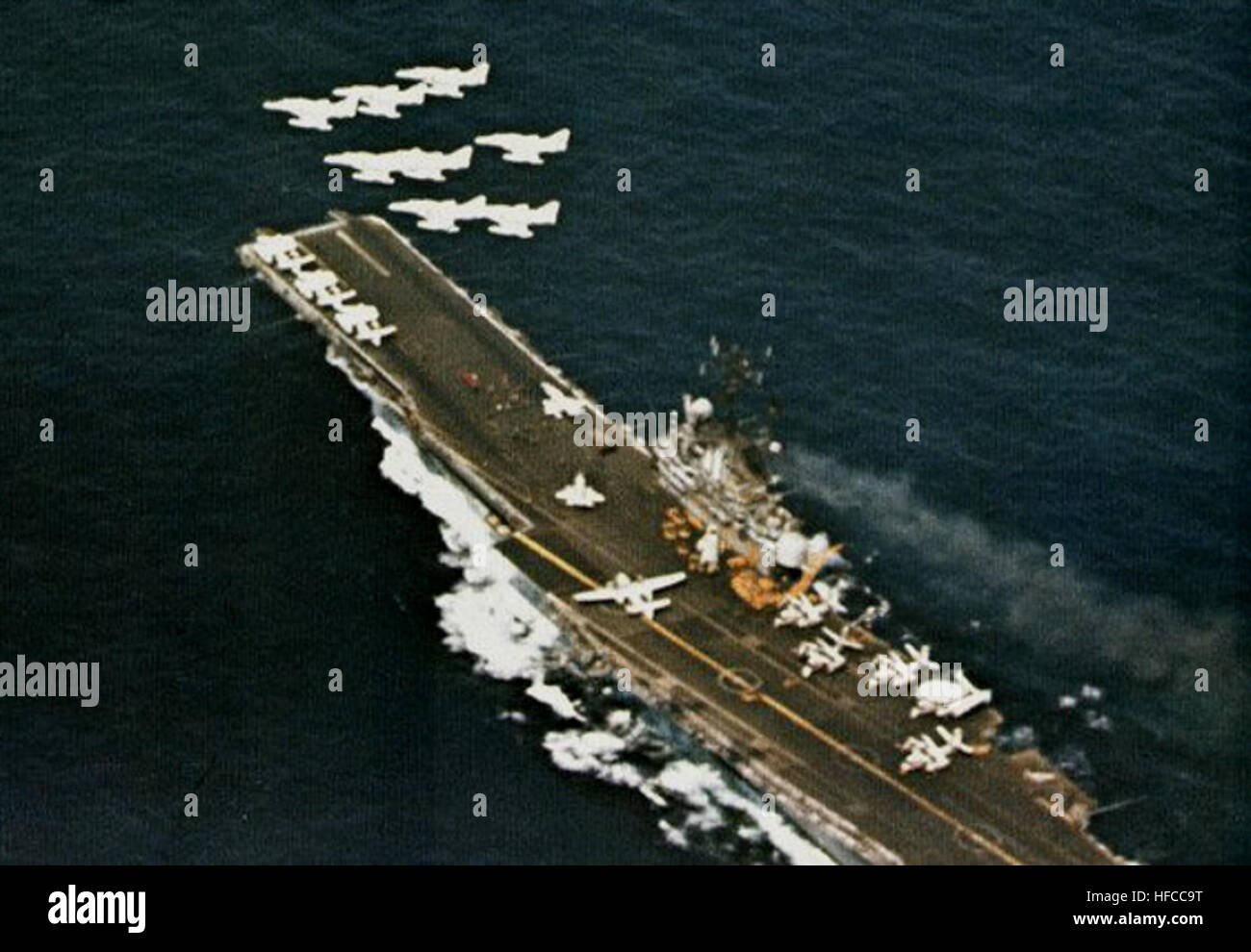 A-4E Skyhawks of VA-45 in flight over USS Intrepid (CVS-11) c1973 Stock ...