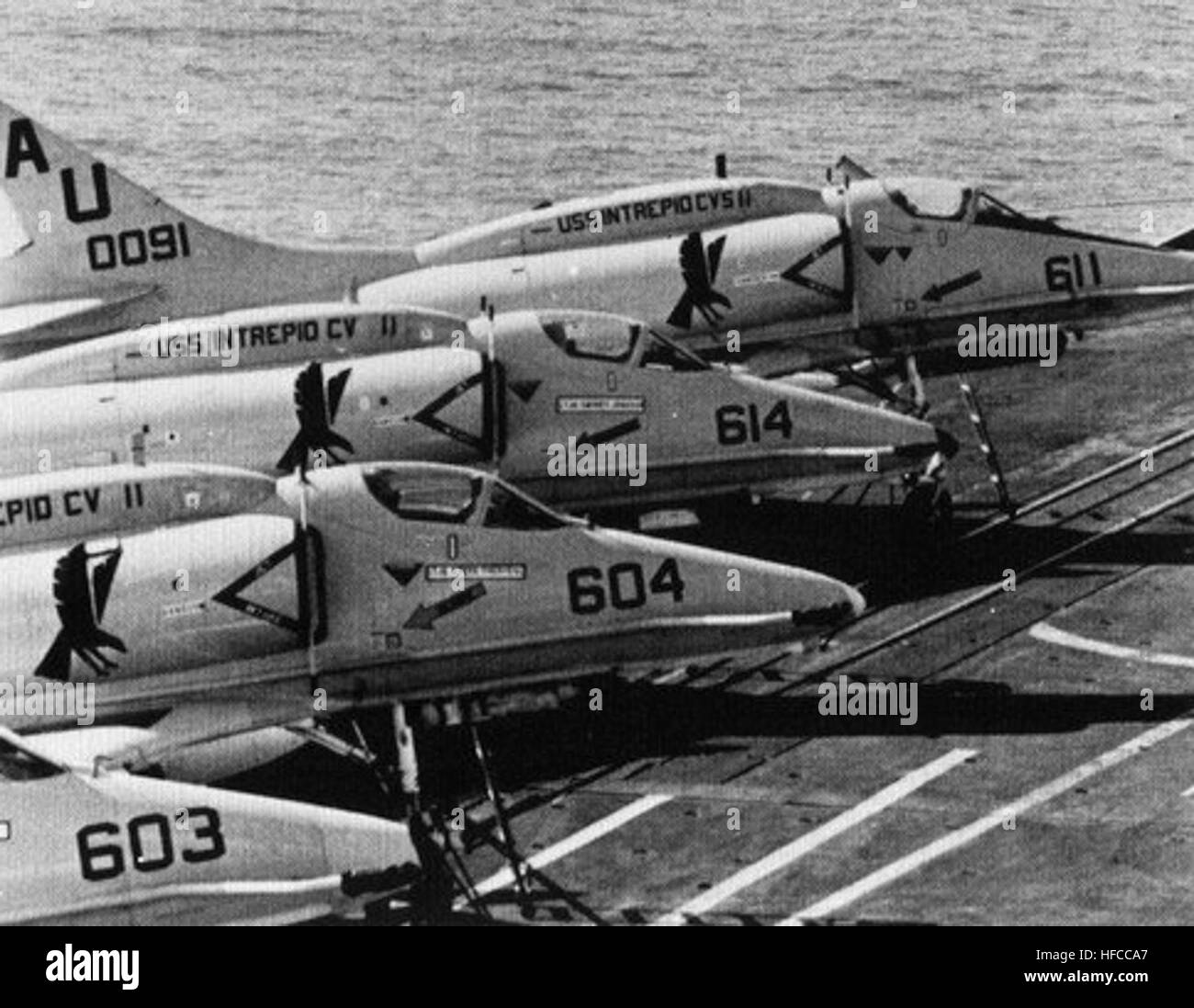 A-4E Skyhawk aircraft assigned to VA-45 are parked and maintained on ...