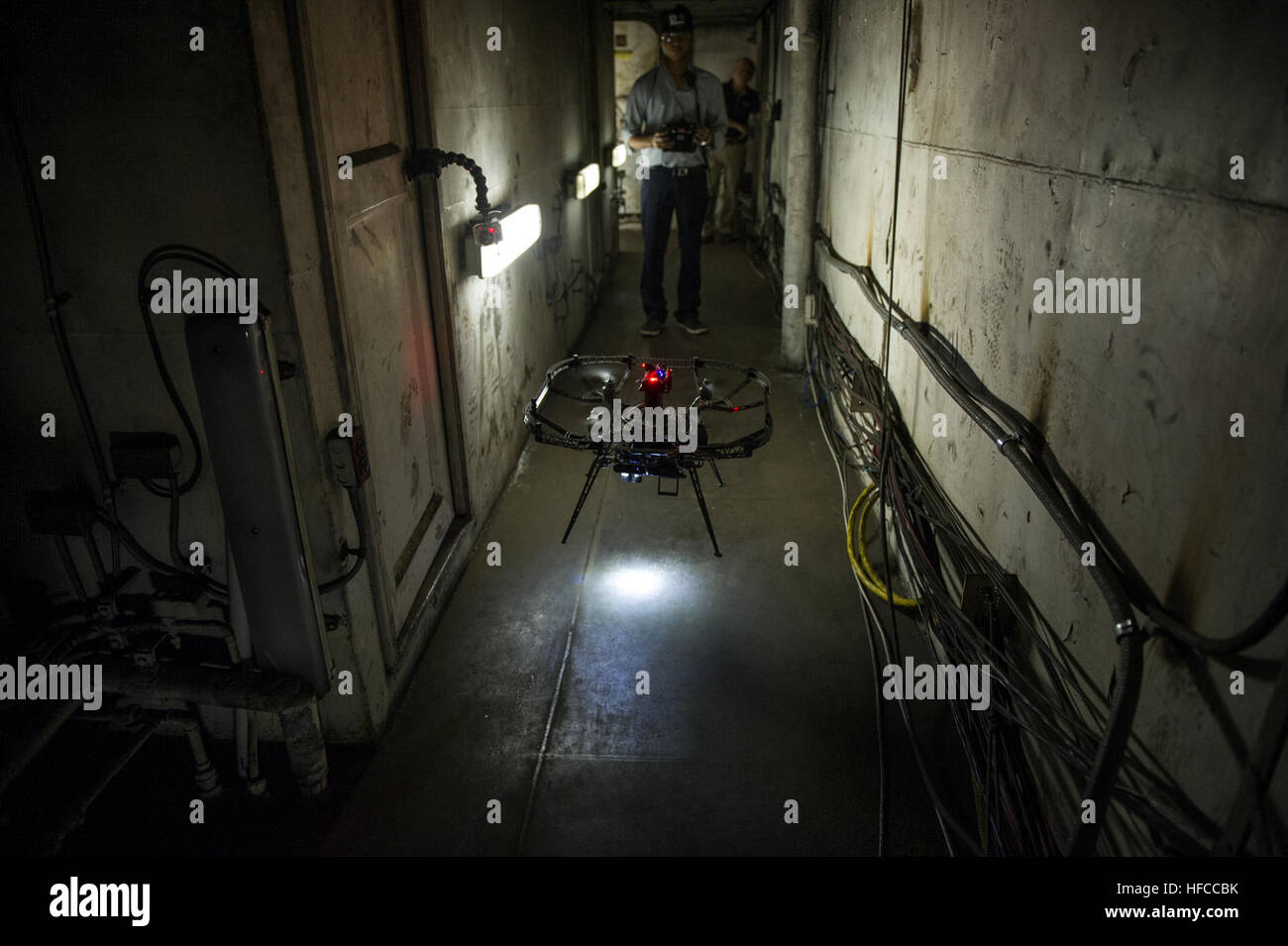 141105-N-PO203-327 MOBILE, Ala. (Nov. 5, 2014) A student-researcher ...