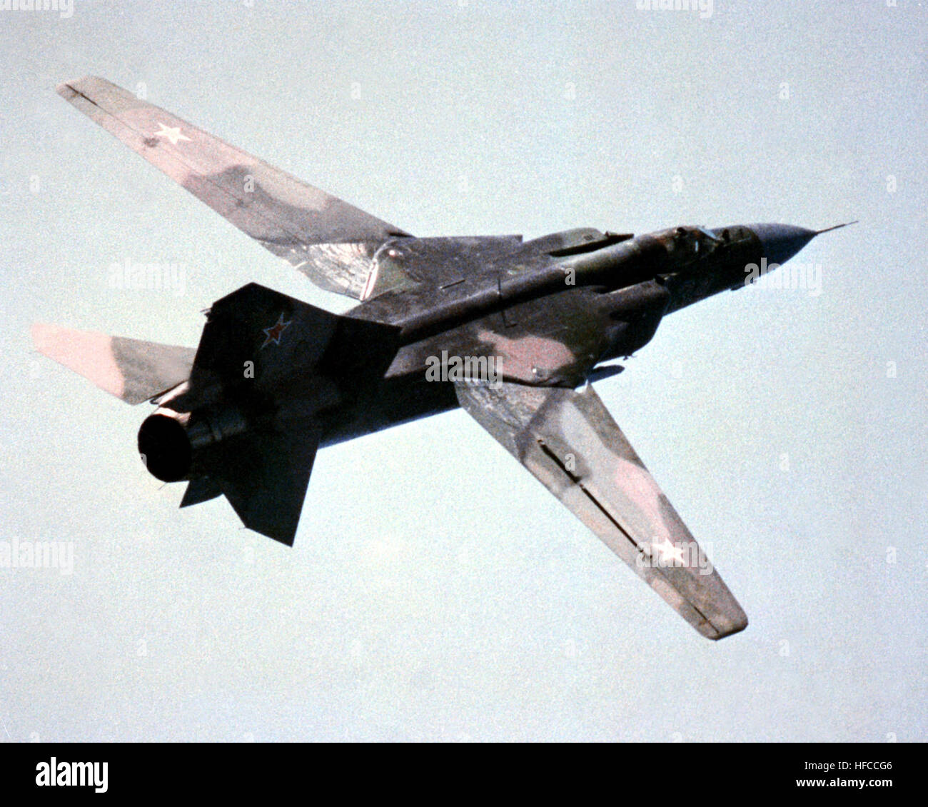 An air-to-air right side view of a Soviet MiG-23 Flogger K aircraft ...