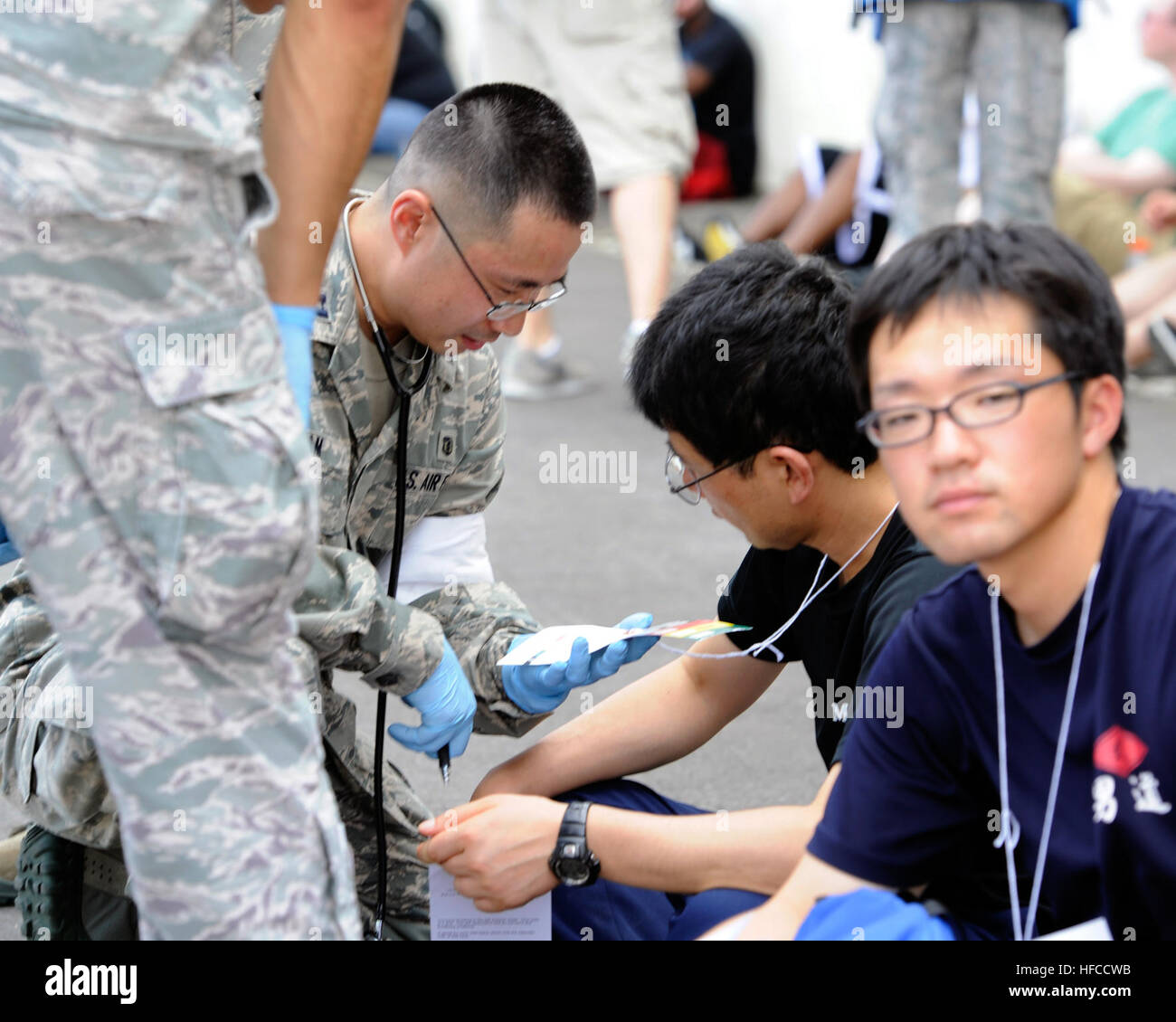 MISAWA AIR BASE, Japan (Aug. 30, 2012) An Air Force emergency responder ...