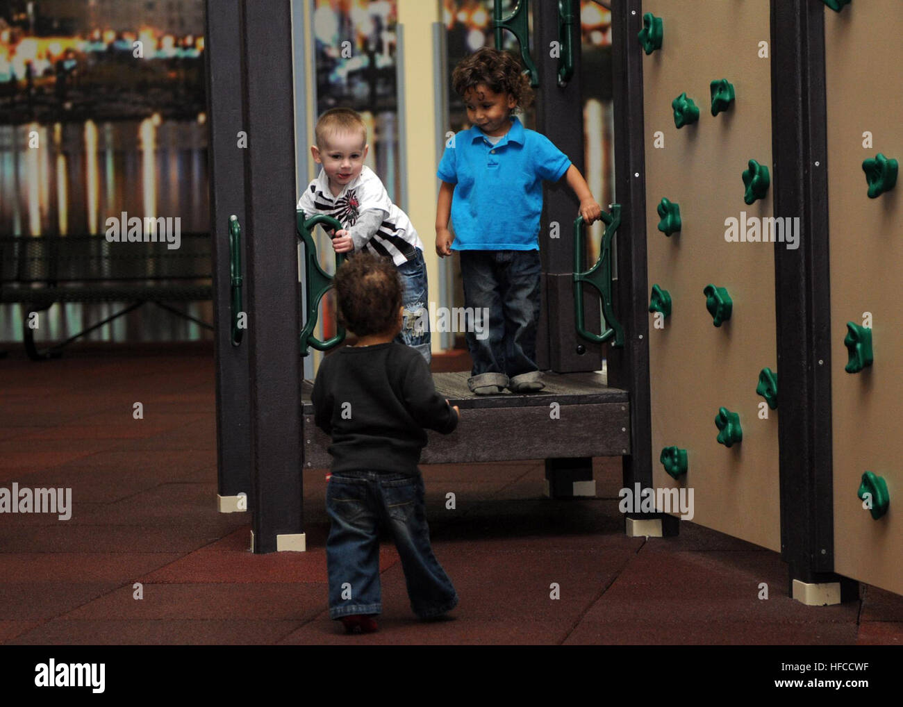 Children play at the Weasels' Den, an indoor play facility at Misawa ...