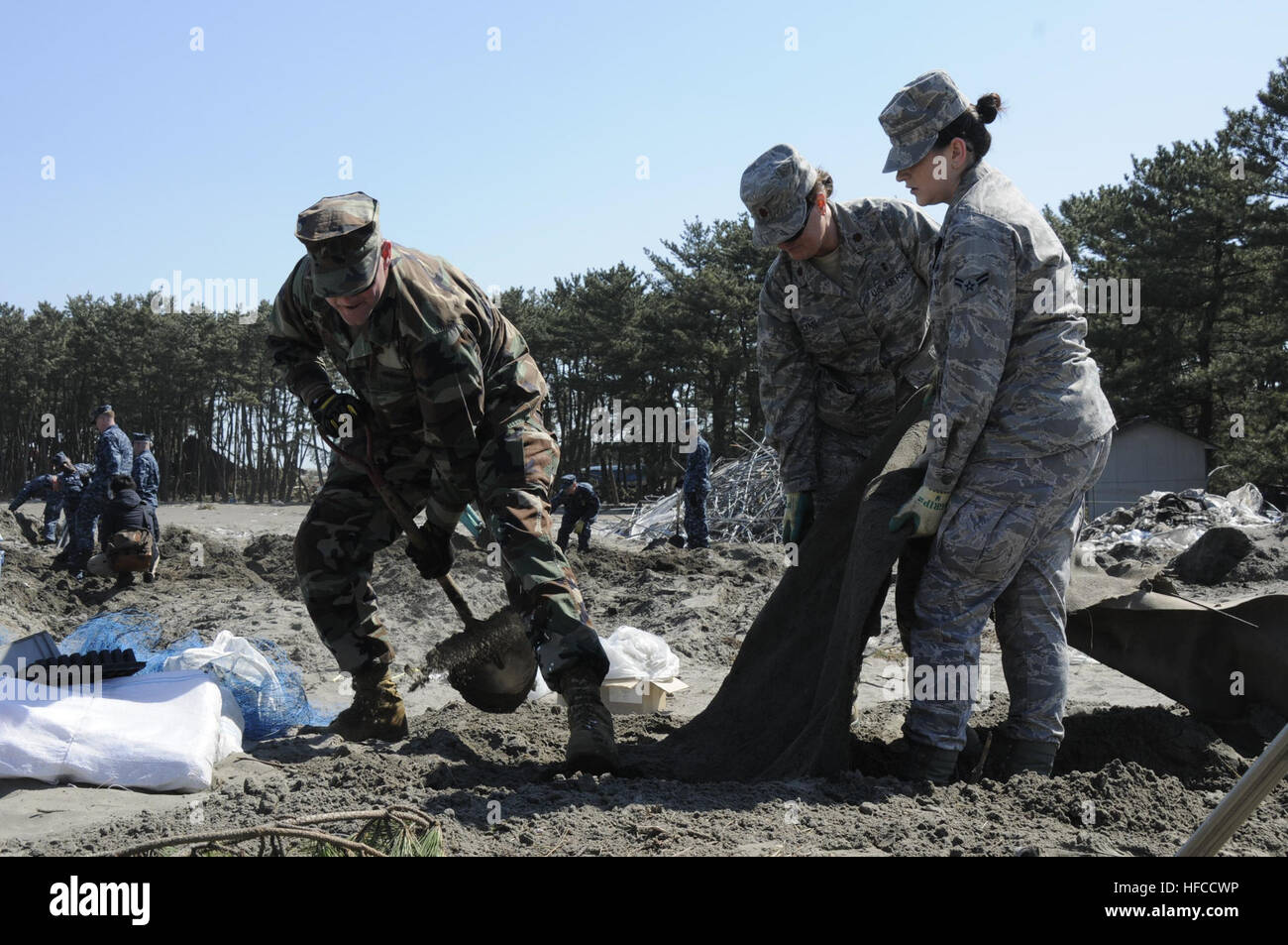 Tsunami debris personnel hi-res stock photography and images - Alamy