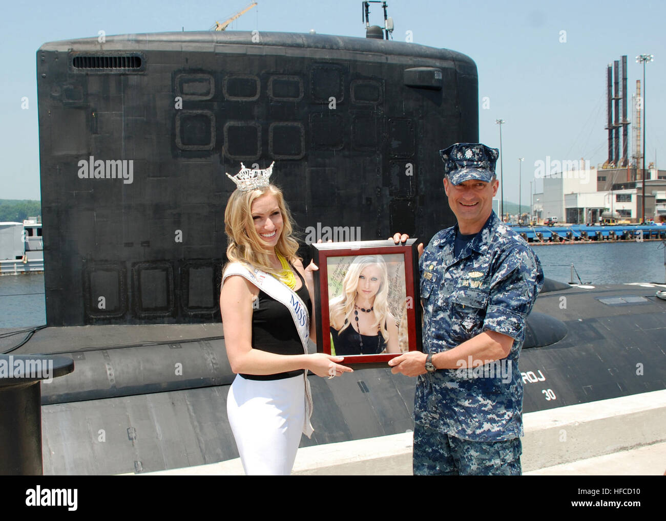 Elizabeth Crot, Miss Virginia 2011, presents an autographed portrait of ...