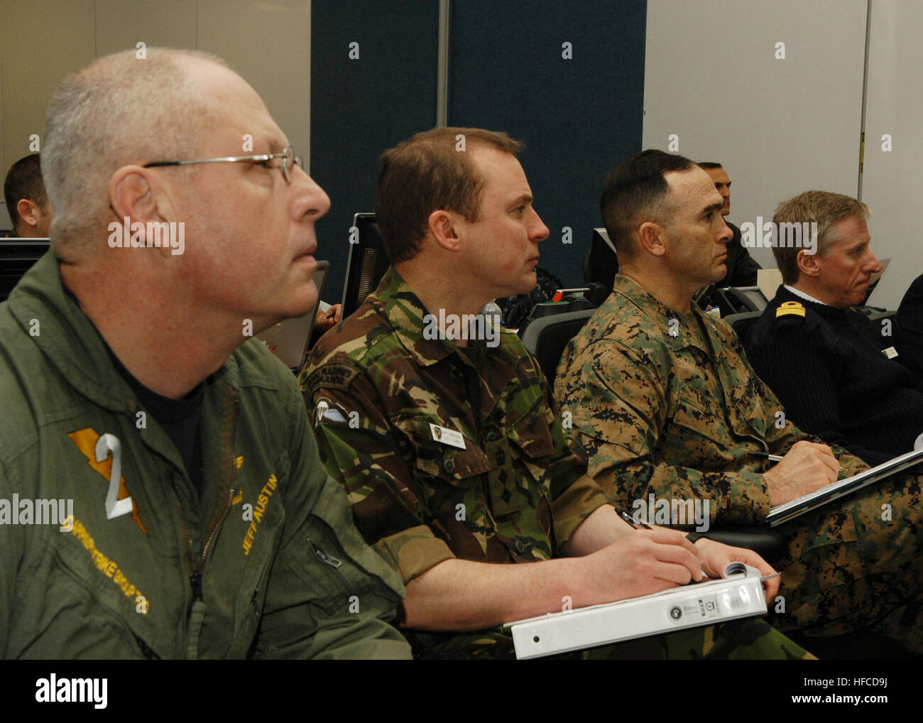 Left to right, U.S. Capt. Jeff Austin, Carrier Strike Group Two liaison ...