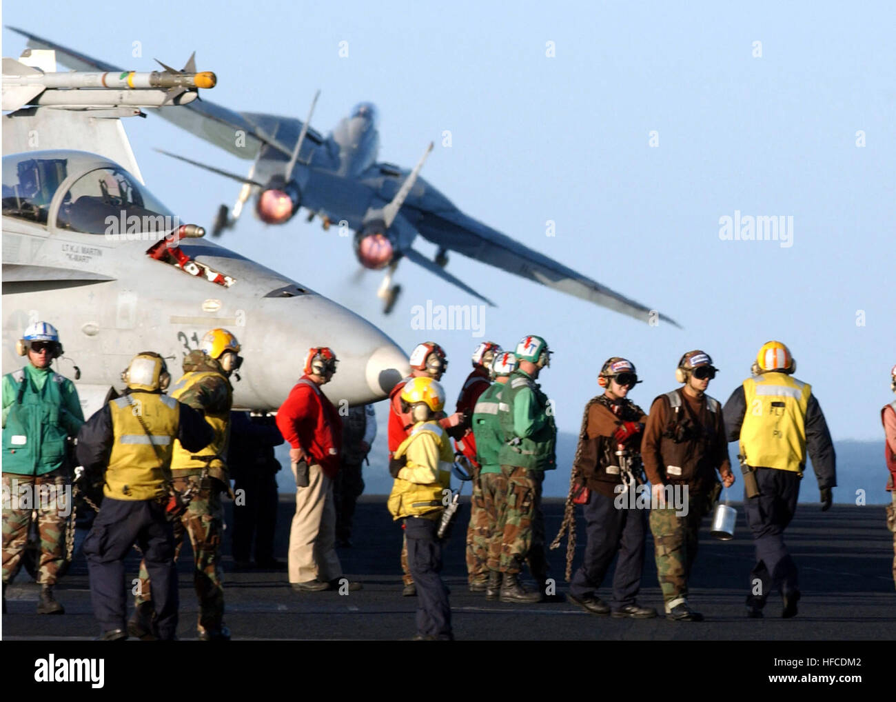 An F-14 Tomcat from Fighter Squadron 102 (VF-102) launches from one of ...