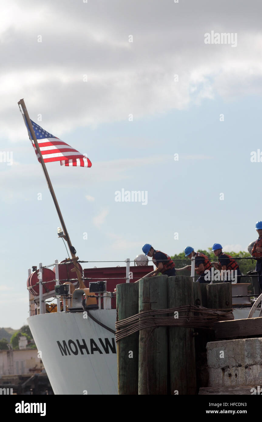 U.S. Coast Guardsmen, attached to U.S. Coast Guard Cutter Mohawk, heave ...