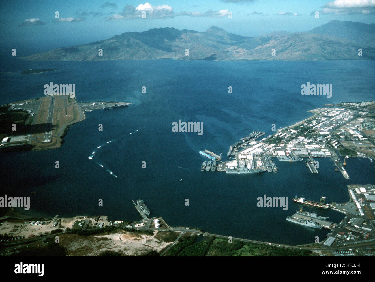 An aerial view of the station and, to the left, Naval Air Station, Cubi ...