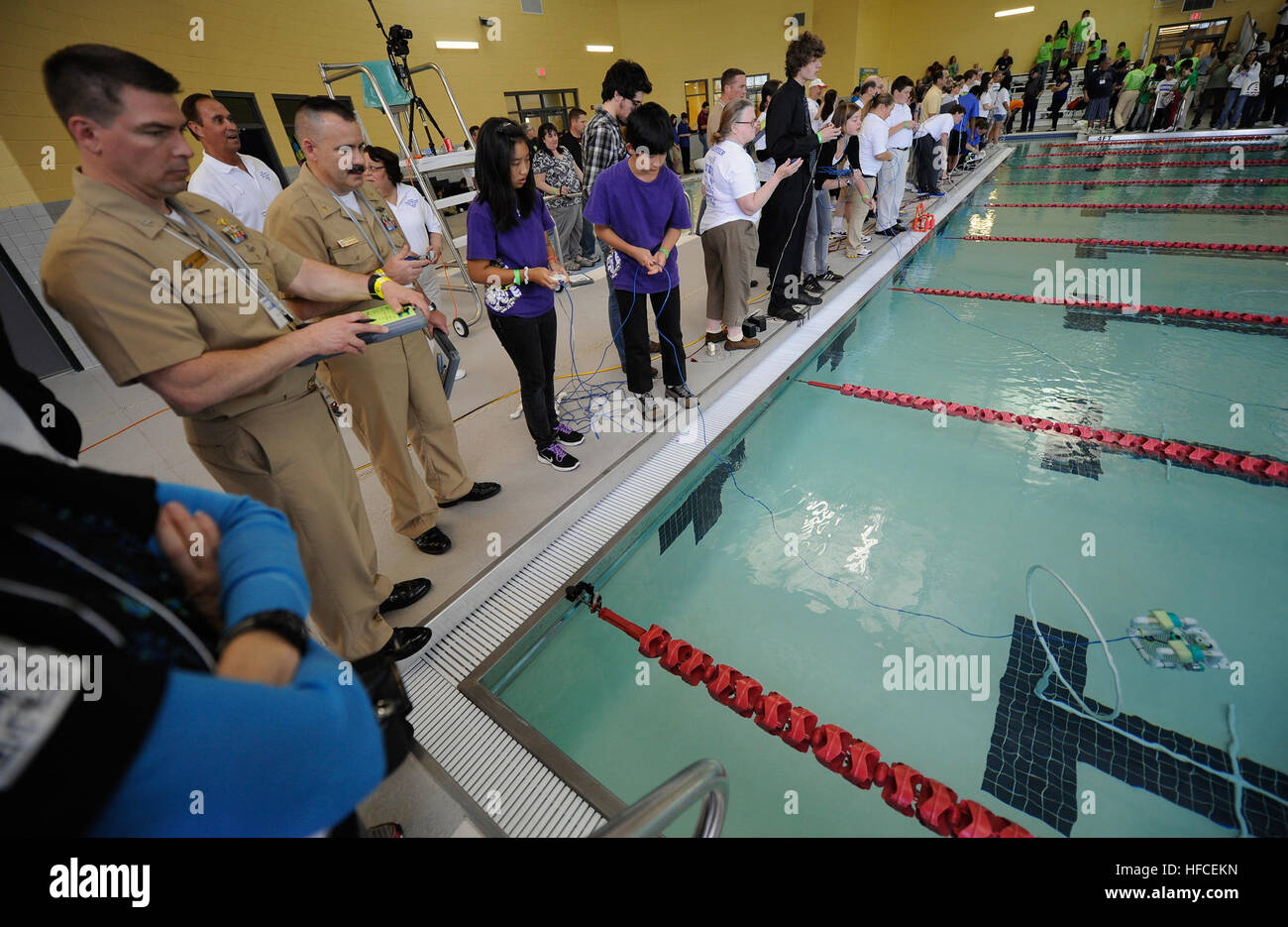 Capt. Robert Palisin, left, deputy department head for the sea warfare ...