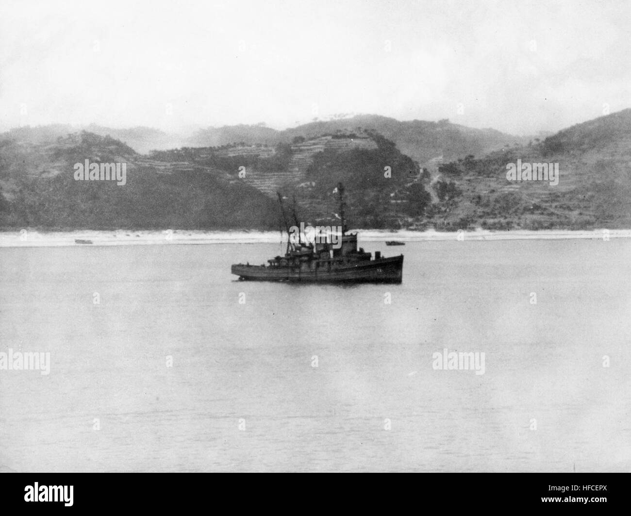 Navajo-class tugboat off Okinawa in 1945 Stock Photo - Alamy