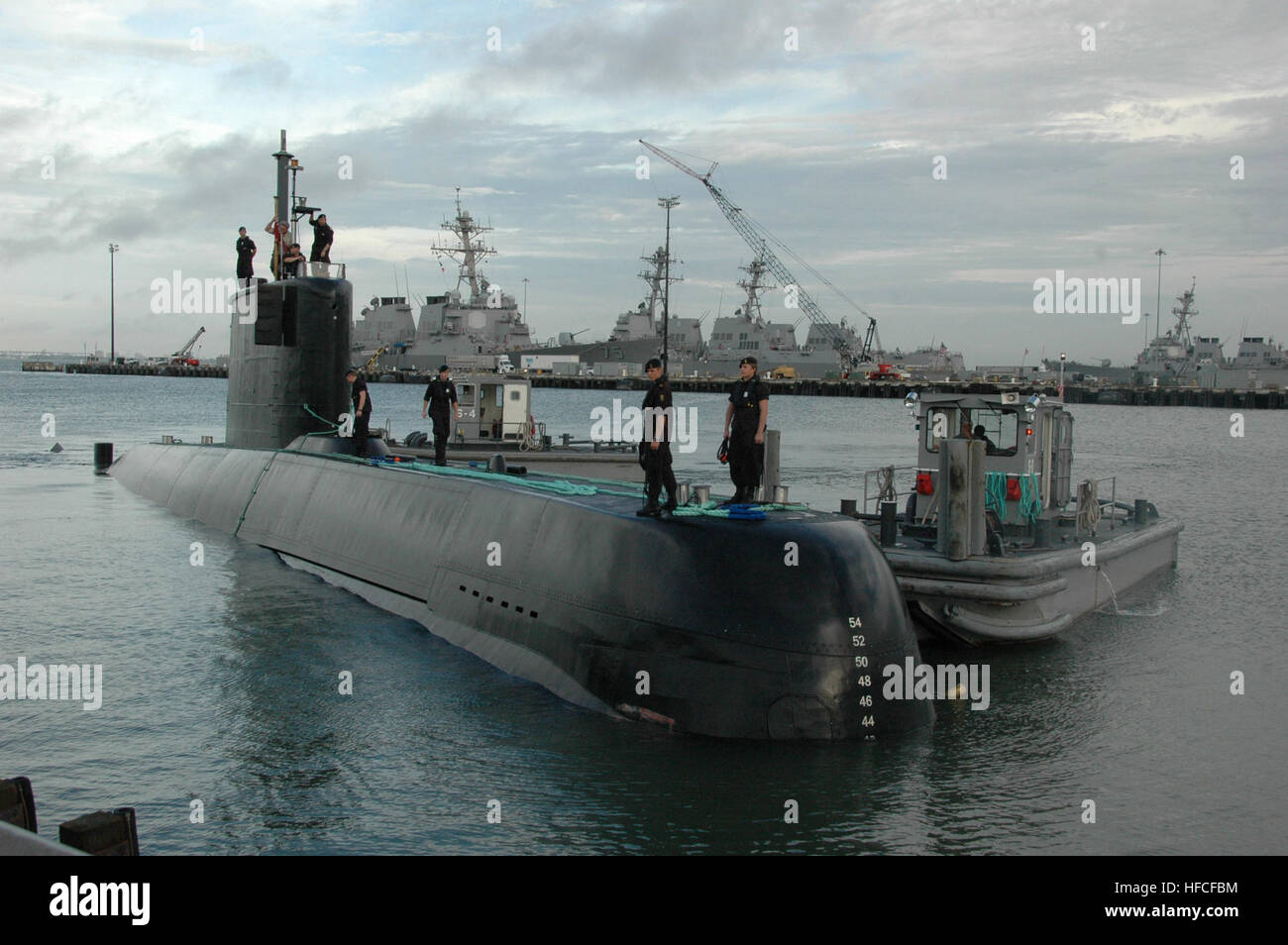 Sailors aboard the Norwegian diesel-electric submarine HNOMS Utvaer ...