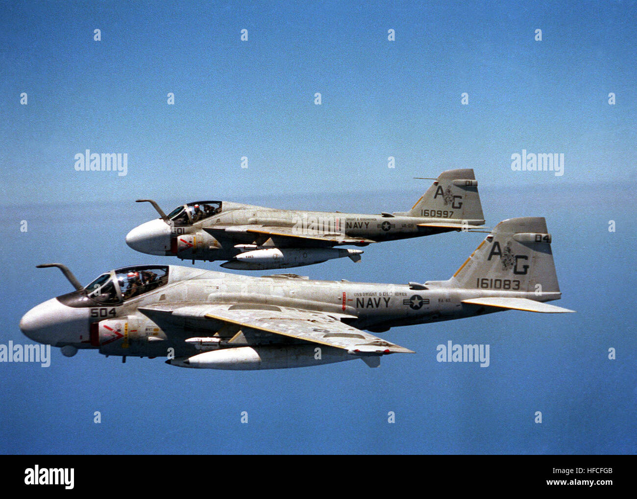 An air-to-air left side view of two Attack Squadron 65 (VA-65) A-6E ...