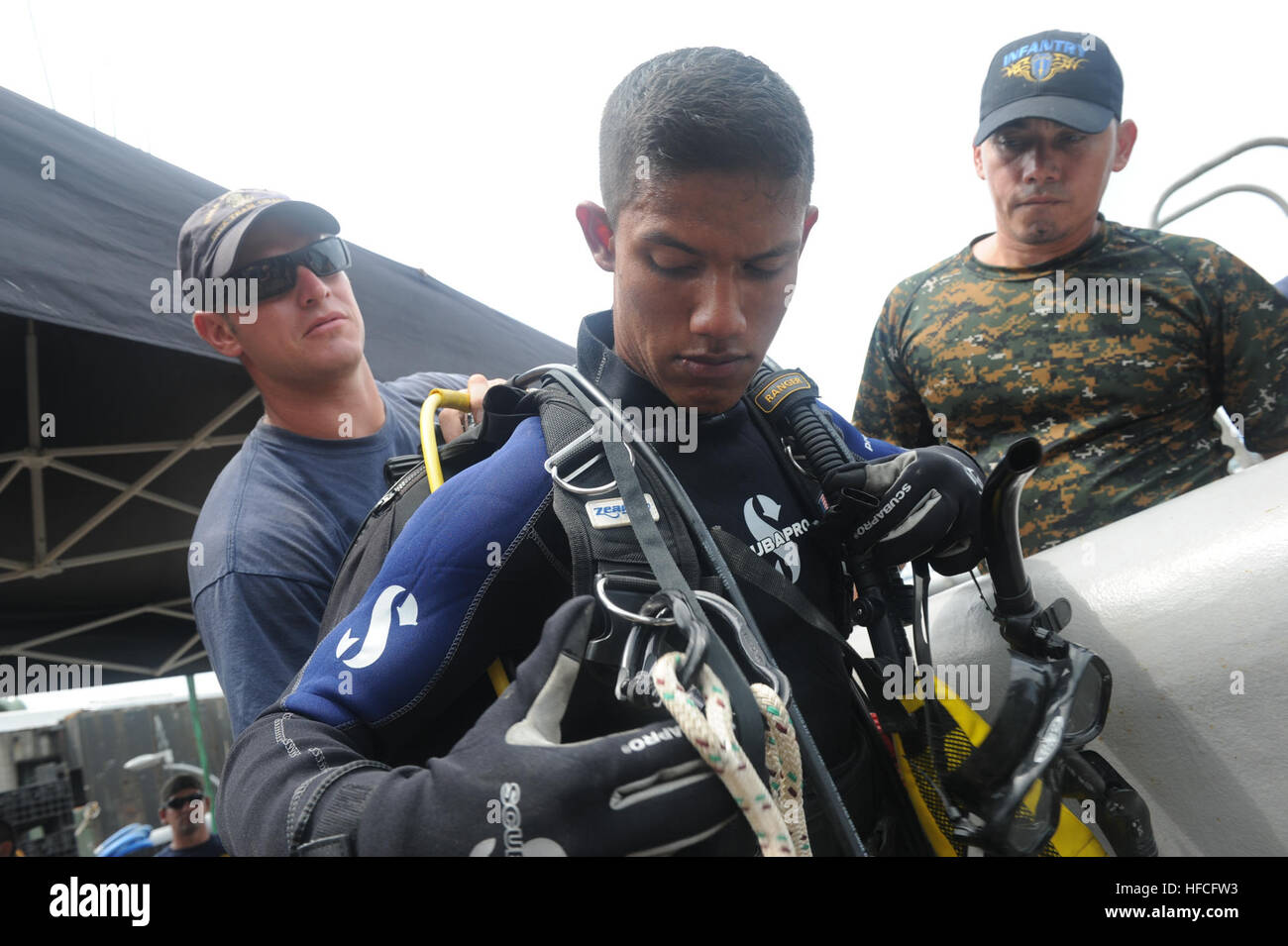 Navy Diver 1st Class Shane Parton, assigned to Mobile Diving and ...