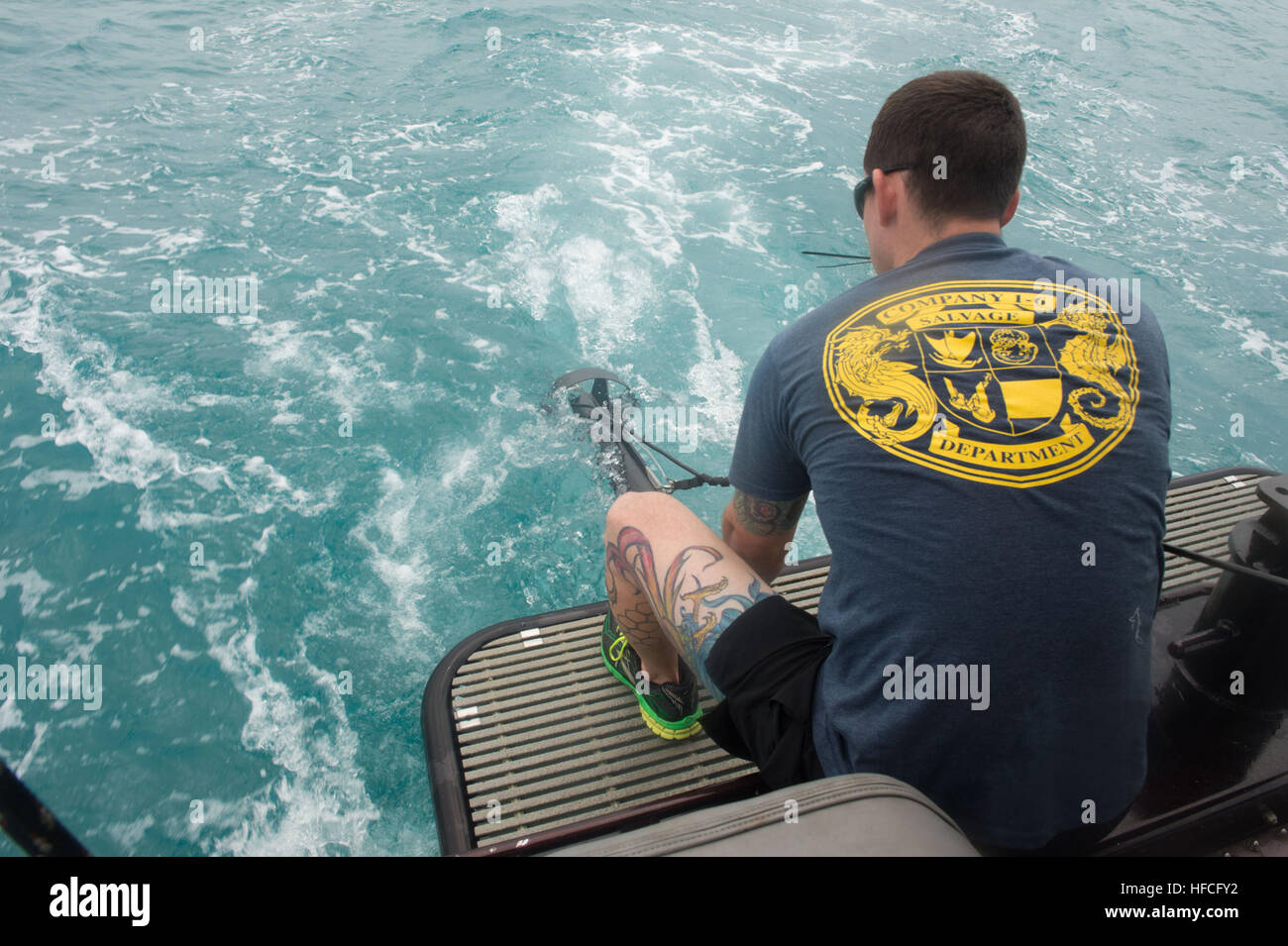 Navy Diver 2nd Class Daniel Clarke, assigned to Mobile Diving and ...