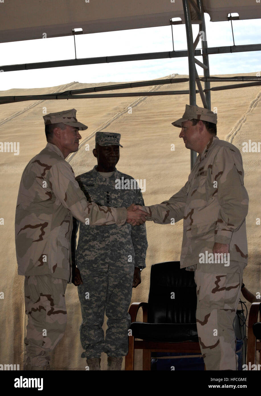 U.S. Navy Rear Adm. Brian L. Losey (left) assumes command of Combined ...