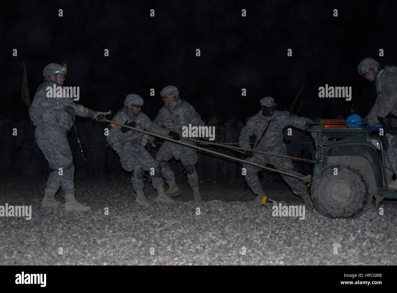 U.S. Soldiers from the 172nd Infantry Brigade pull a chariot using ...