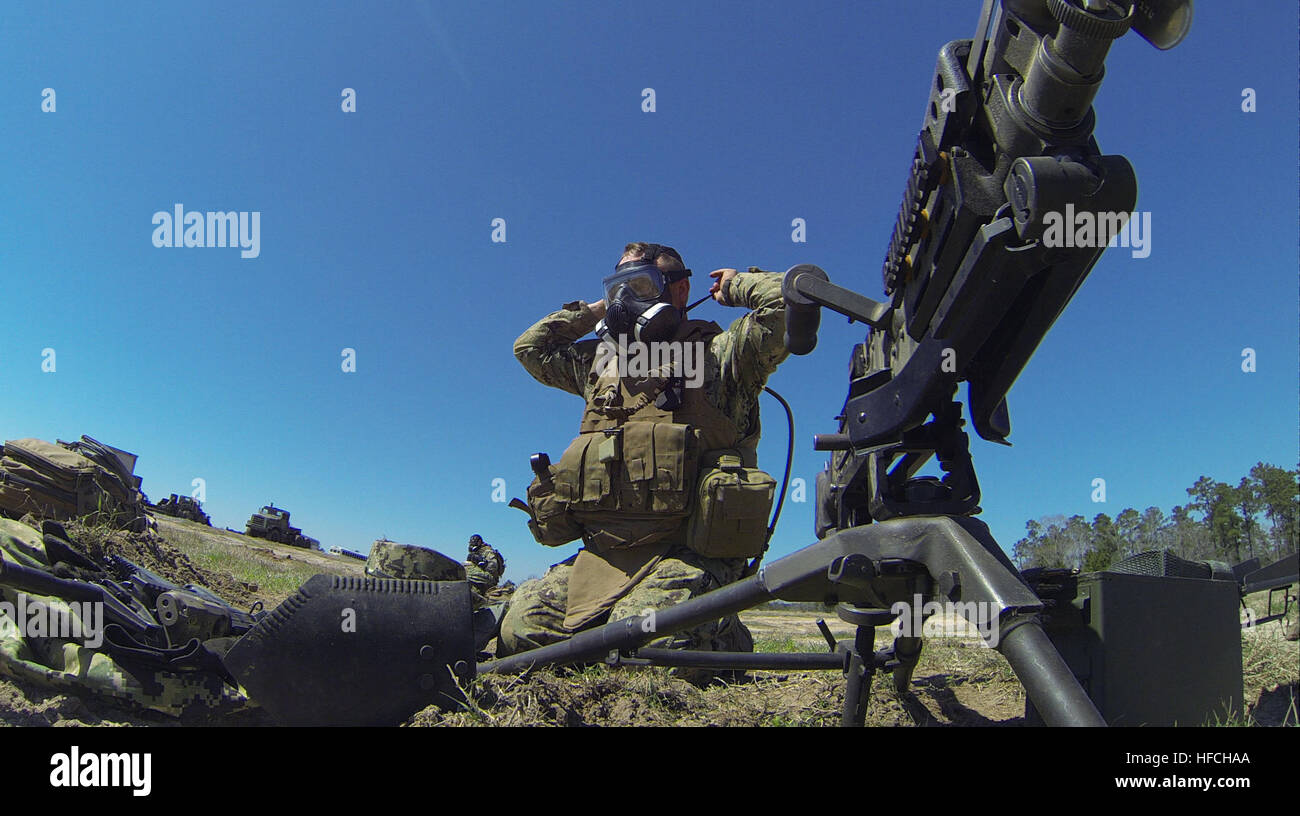 A member of Detachment 4 from Naval Mobile Construction Battalion (NMCB ...