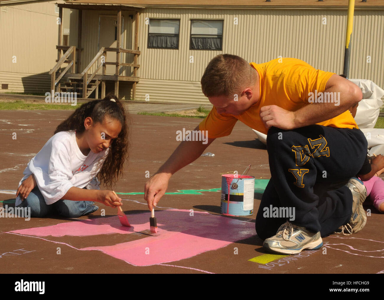 Petty Officer 3rd Class Justin Comer, builder, assigned to Naval Mobile ...