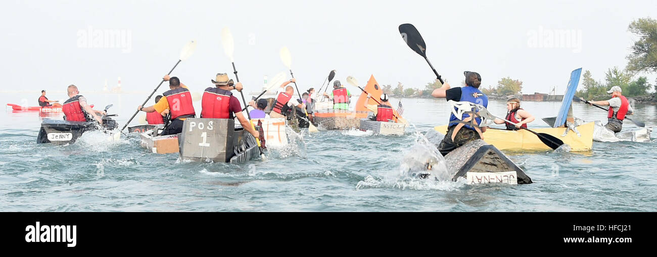 Cardboard boat captains paddle their crafts to the first orange hi-res ...