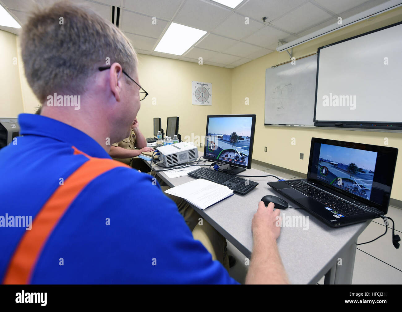 Lt. Andrew Foor, a Naval Reserve Officers Training Corps (NROTC) Naval ...