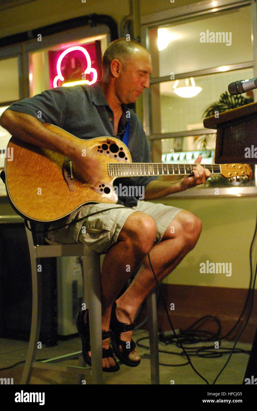 GUANTANAMO BAY, Cuba - Thomas Richards play guitar at Open Mic Night at ...
