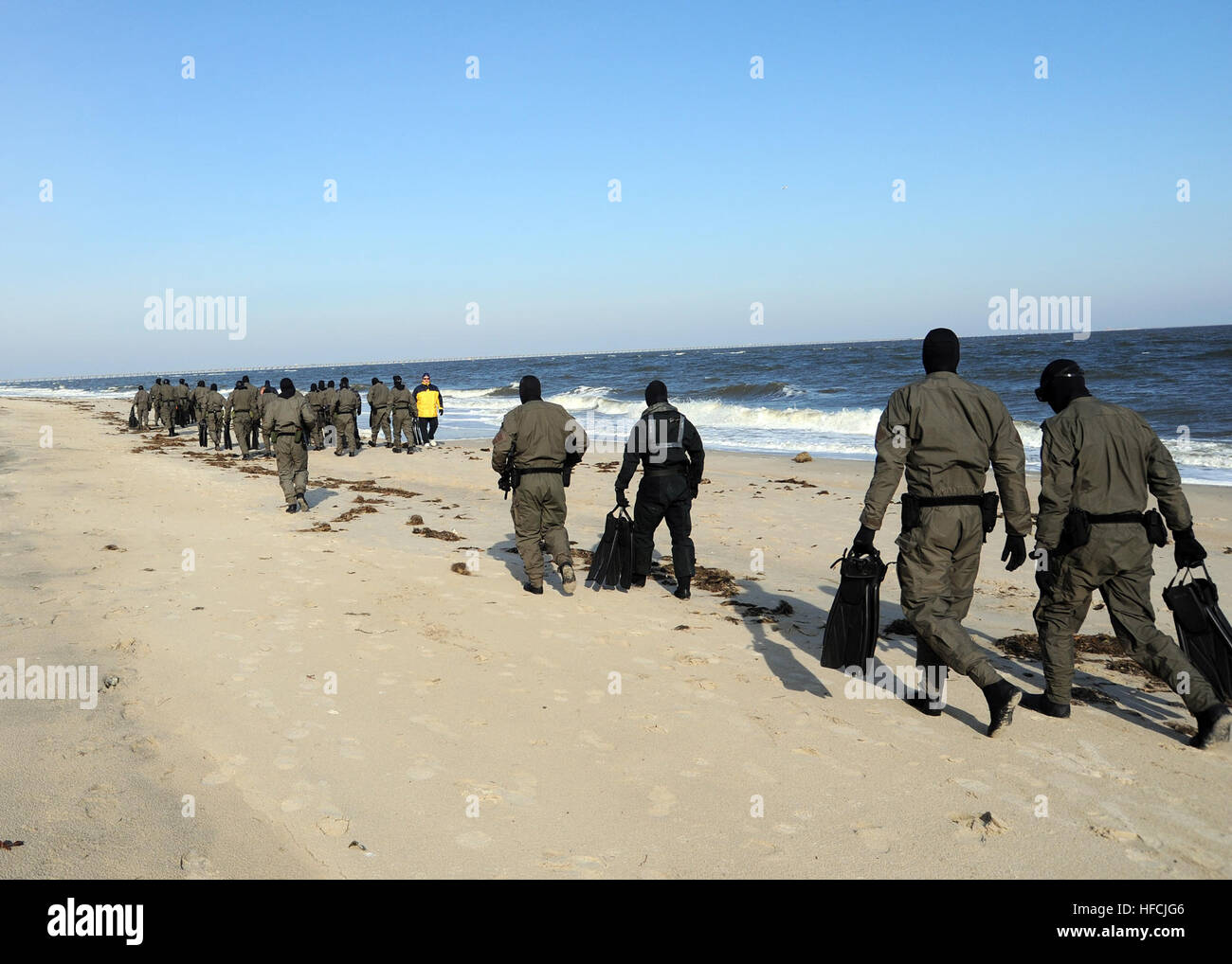 Special Warfare Combatant-craft crewmen walk to the starting point for ...