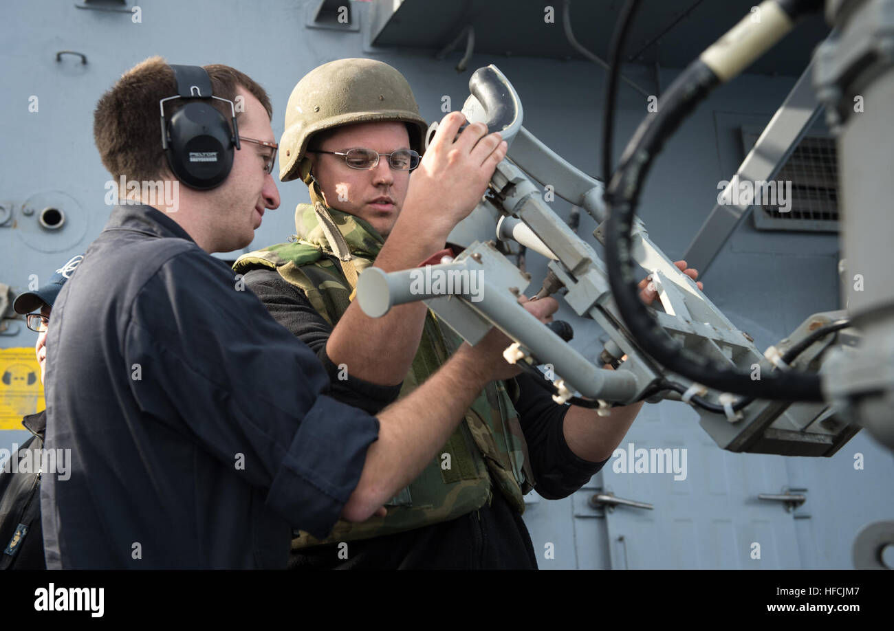 Fire Controlman 3rd Class Thomas Colton, right, and Fire Controlman 2nd ...