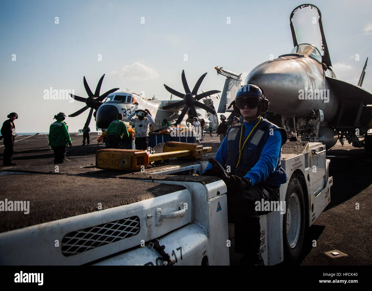 Aviation Boatswain’s Mate (Handling) Airman Dylan Mills uses a tow ...