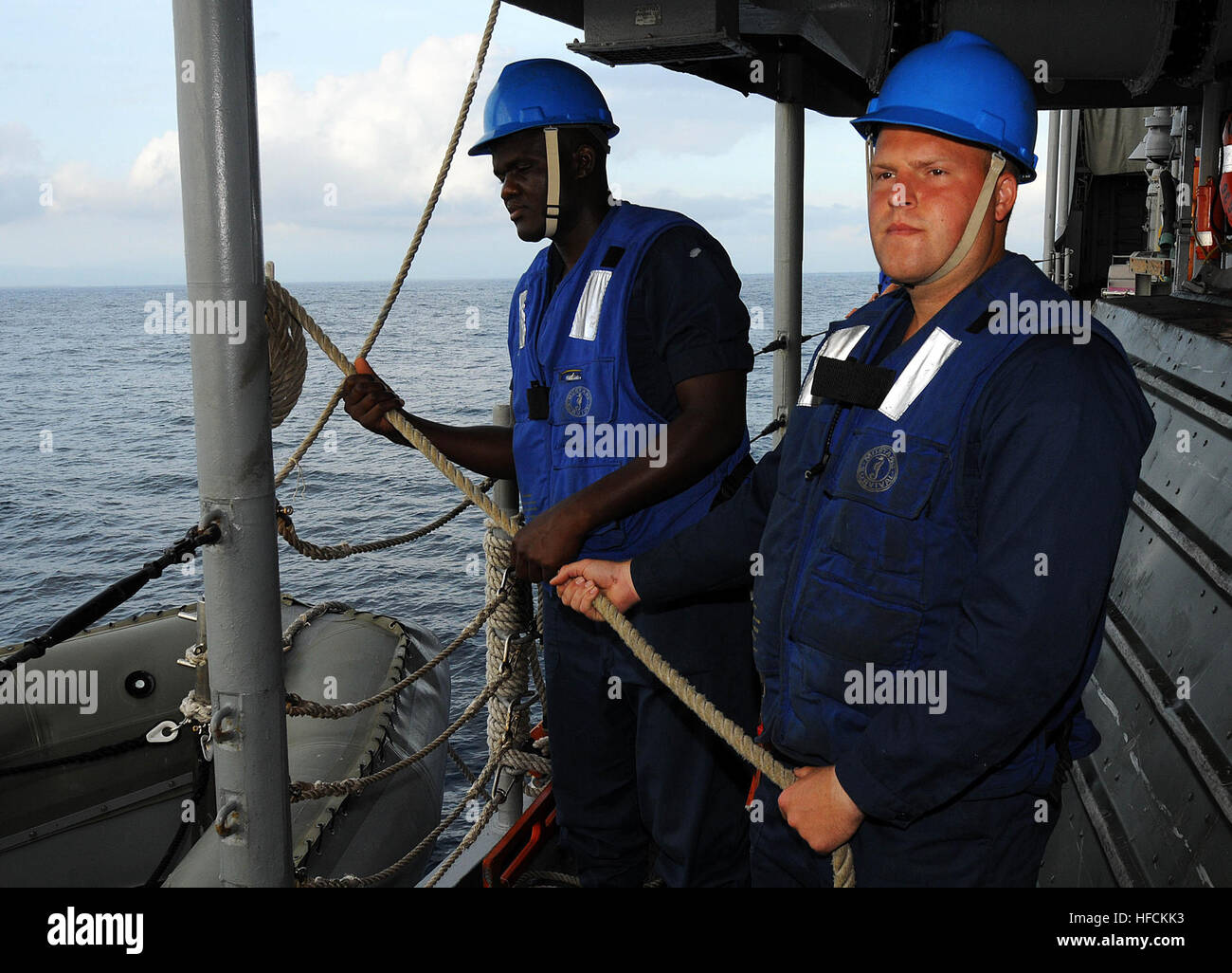U.S. Navy Seaman Francis Mliswa, left, and Seaman Aaron Drendel stand ...