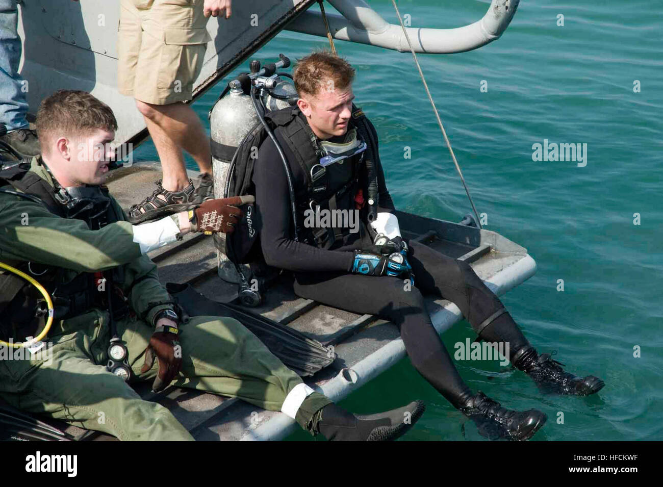 Staff Sgt. Stephen Key and Sgt. Randy Mackey, Army divers assigned to ...