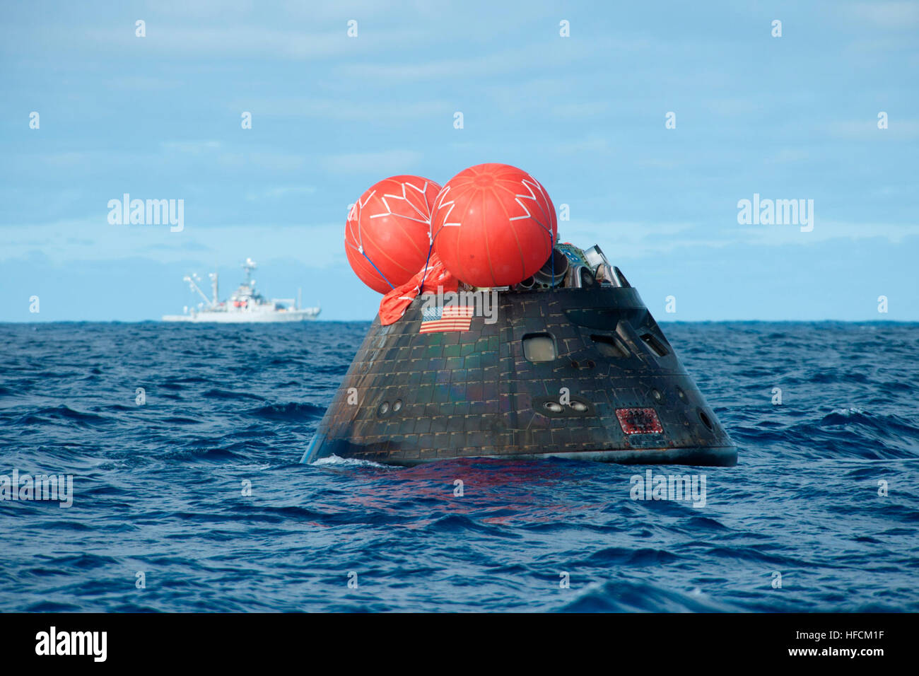 Crew module after splash down in the Pacific Ocean with the Crew Module ...