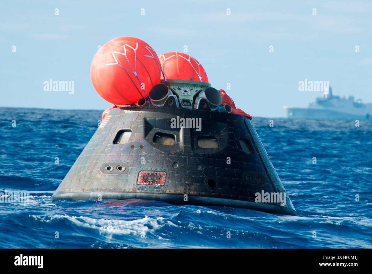 Crew module after splash down in the Pacific Ocean with the Crew Module ...