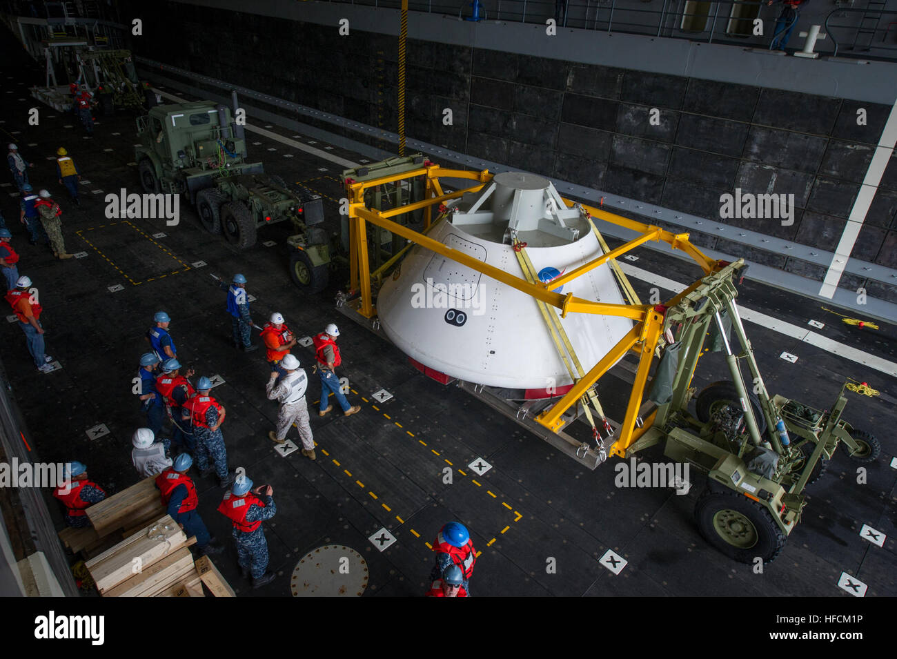 NORFOLK (Aug. 12, 2013) Sailors aboard the amphibious transport dock ...