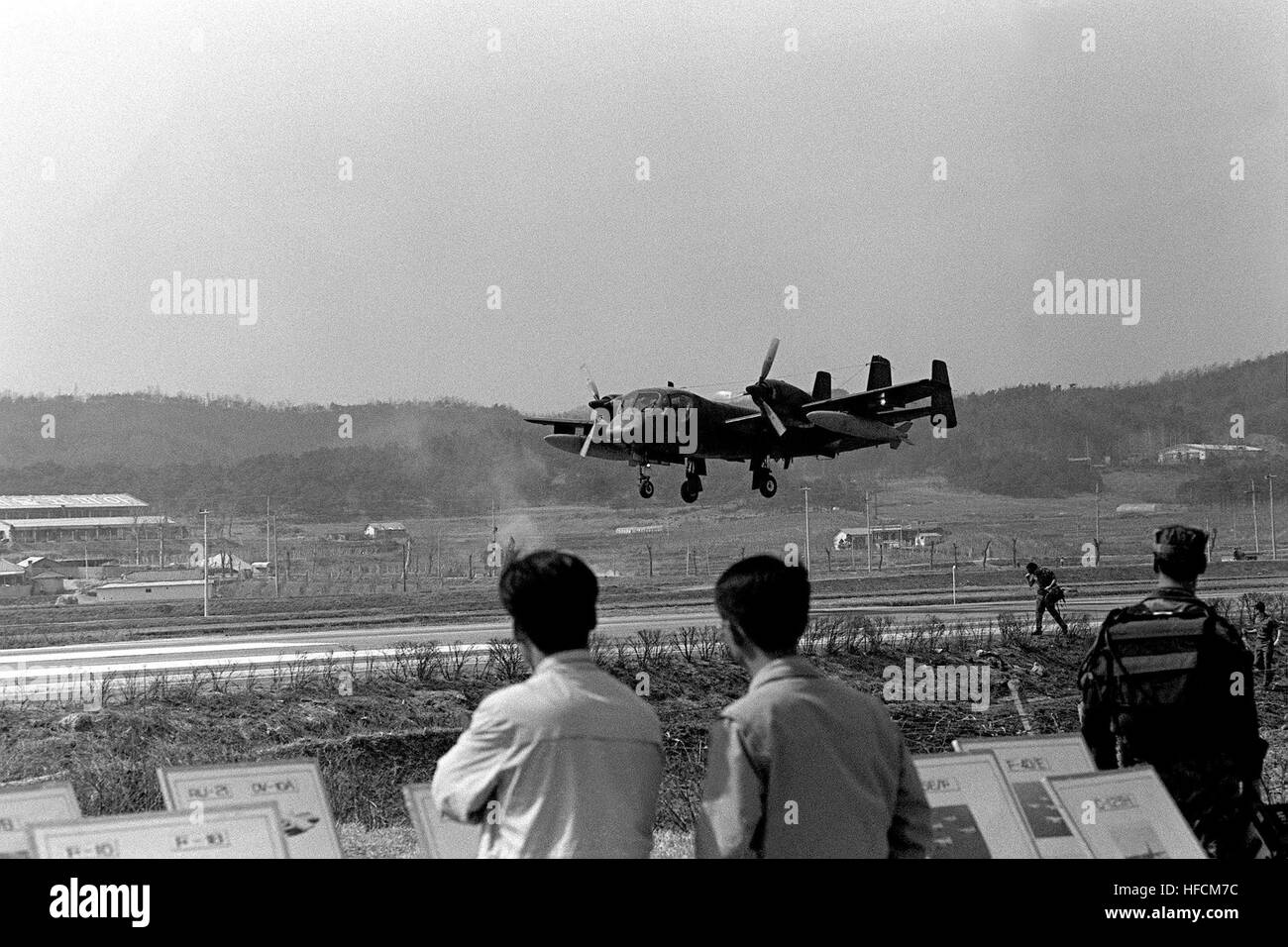 A left side view of an OV-1D Mohawk aircraft approaching for a landing ...