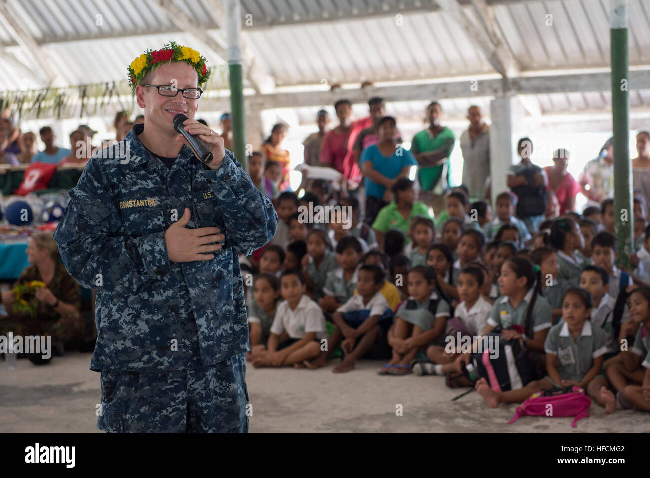U.S. Navy Lt. Jason Constantine, a chaplain, gives the opening prayer ...
