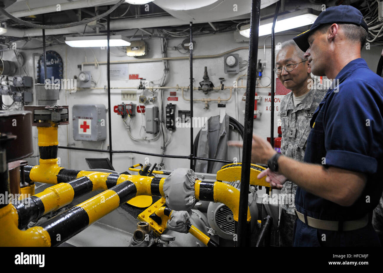 Executive officer Cmdr. Christopher Kipp shows Army Reserve Maj. Gen ...