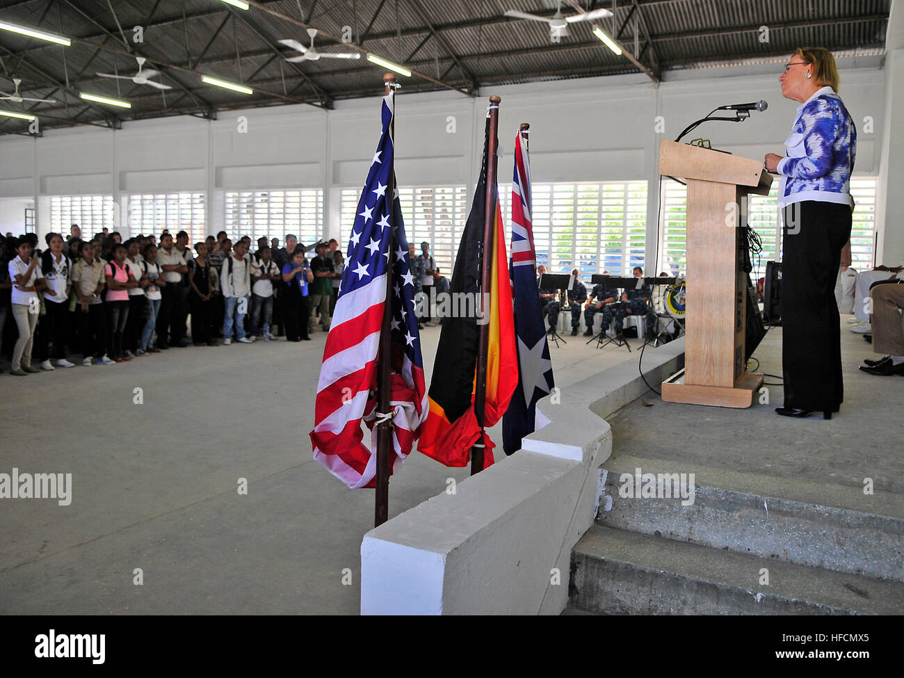 Ambassador Judith R. Fergin speaks to various dignitaries and guests ...