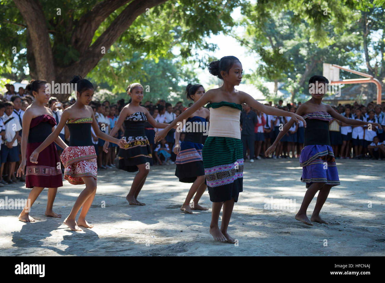 Timorese students with the Comoro Elementary School perform a ...