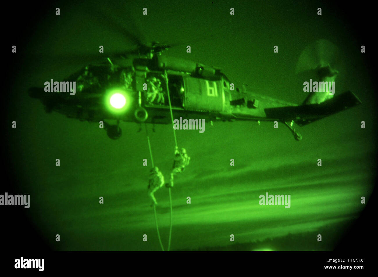 Members of the Chilean Armed Forces perform a night-time fast rope ...