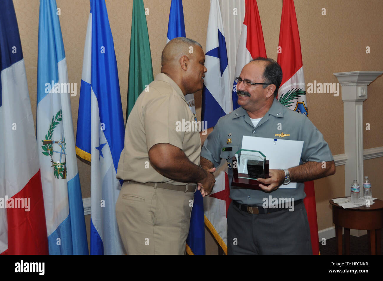 Rear Adm. Sinclair Harris (left), commander, U.S. Naval Forces Southern ...