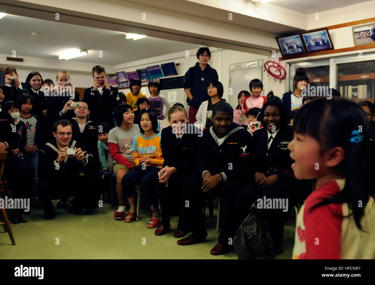 Sailors assigned to the amphibious command ship USS Blue Ridge and ...