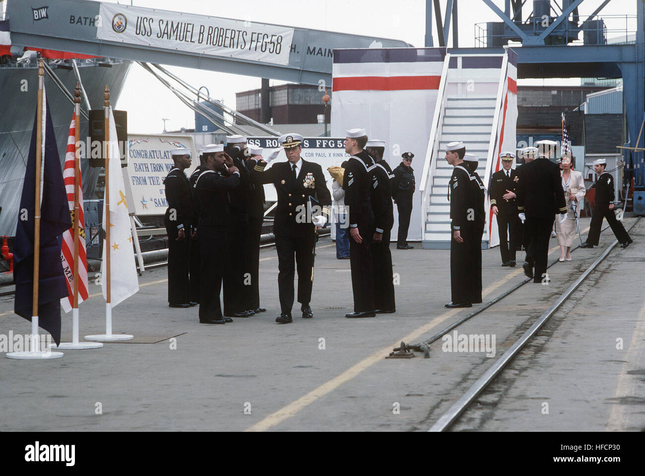 Captain (CAPT) Paul X. Rinn, prospective commanding officer, passes ...