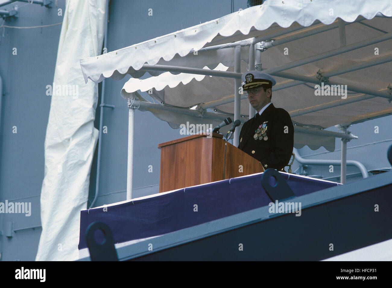 Commander (CDR) Paul X. Rinn, commanding officer, speaks during the ...