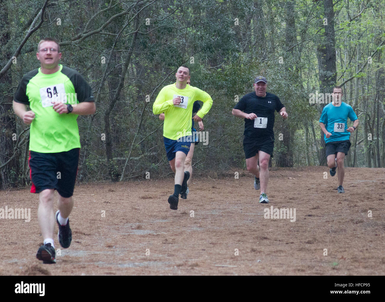 Sailors complete the inaugural 5K run/walk aboard the aircraft carrier ...