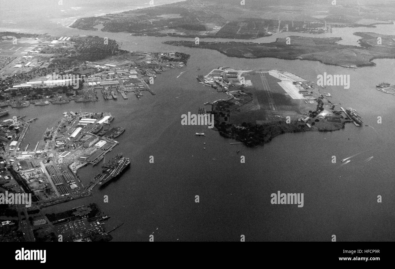 Aerial view of Pearl Harbor showing the harbor layout, naval piers ...