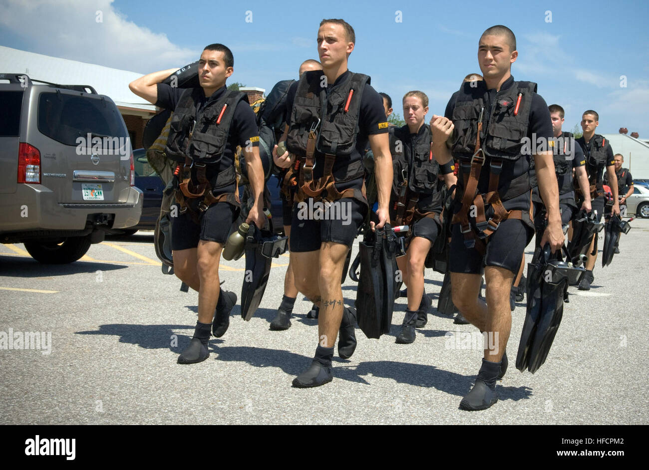 Candidates attending Rescue Swimmer School march to the aircrew water ...