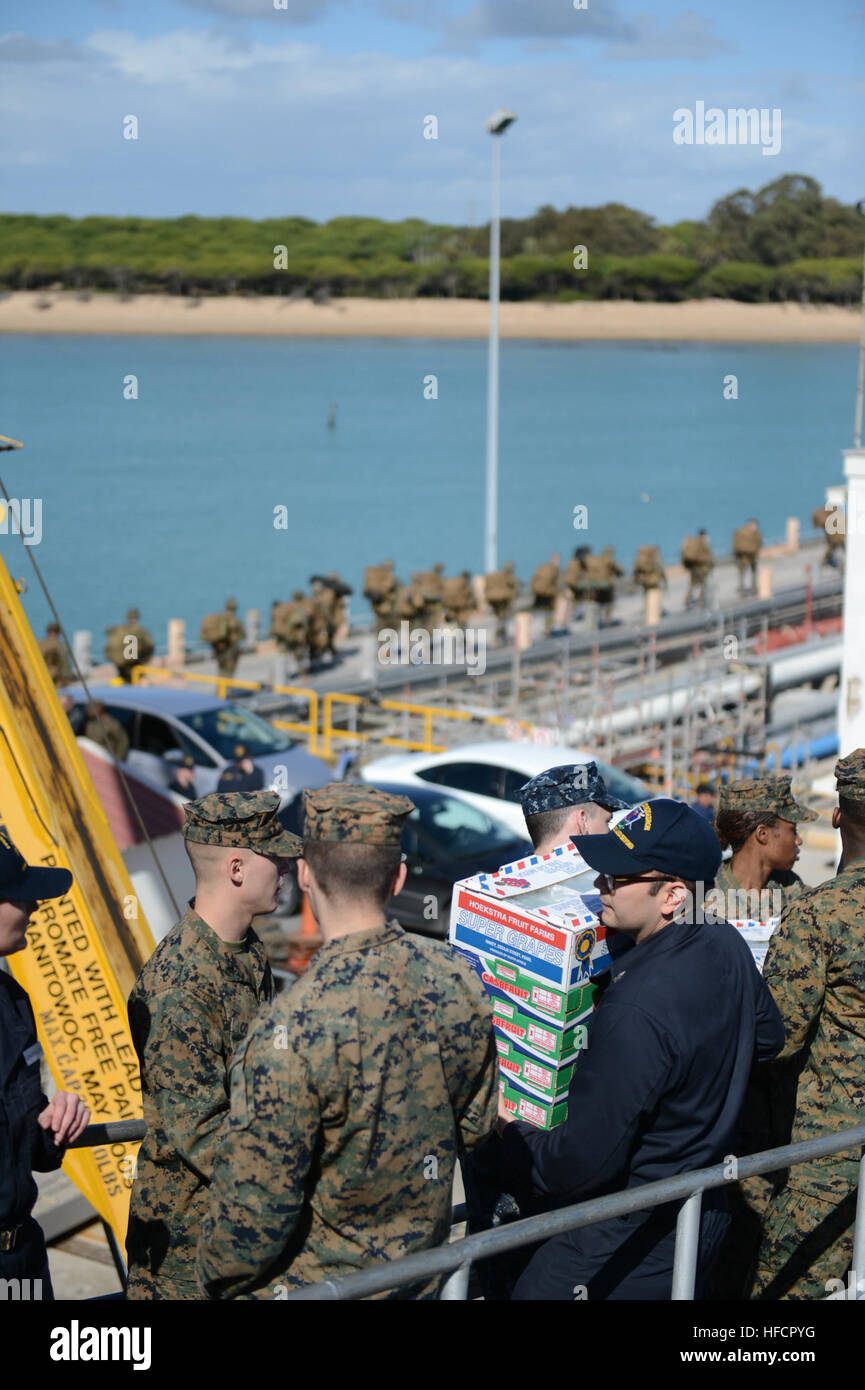 U.S. Marines assigned to the 22nd Marine Expeditionary Unit and Sailors ...