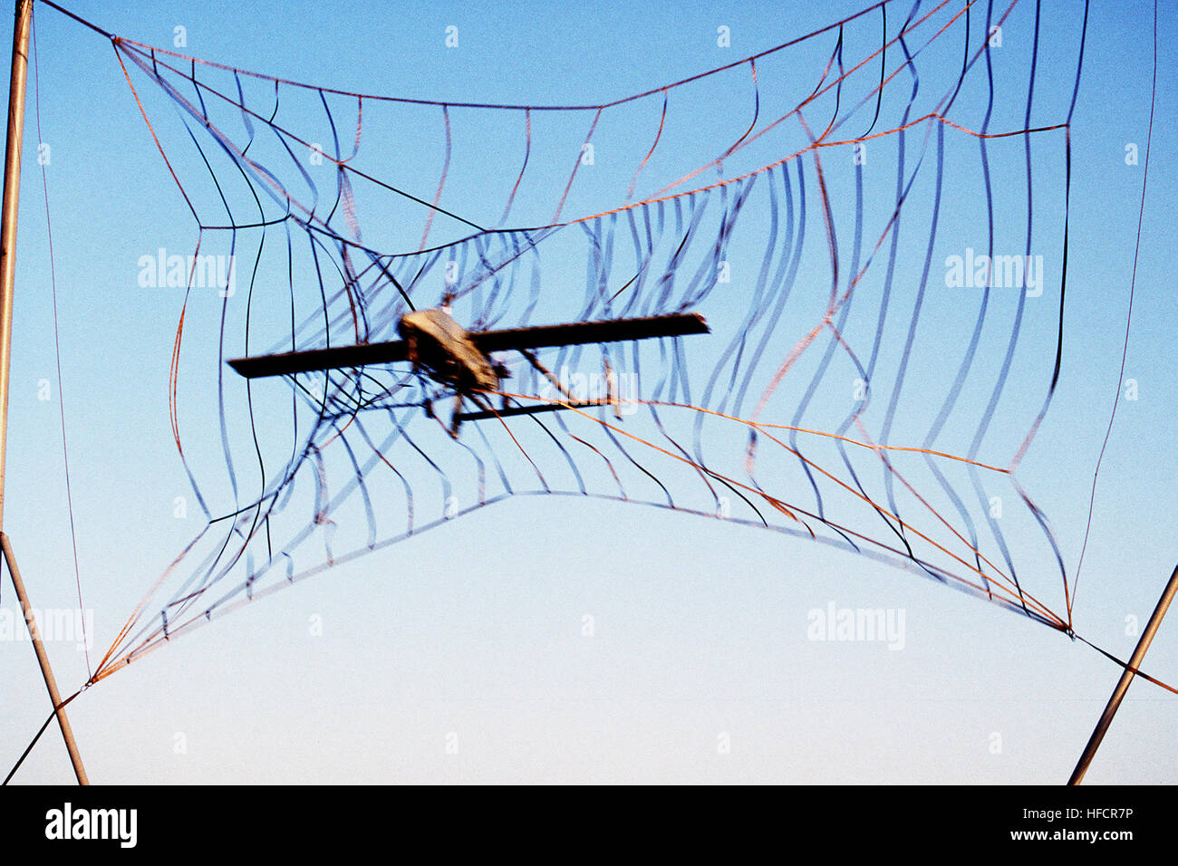 A Pioneer remotely piloted vehicle (RPV) is recovered in a net aboard ...